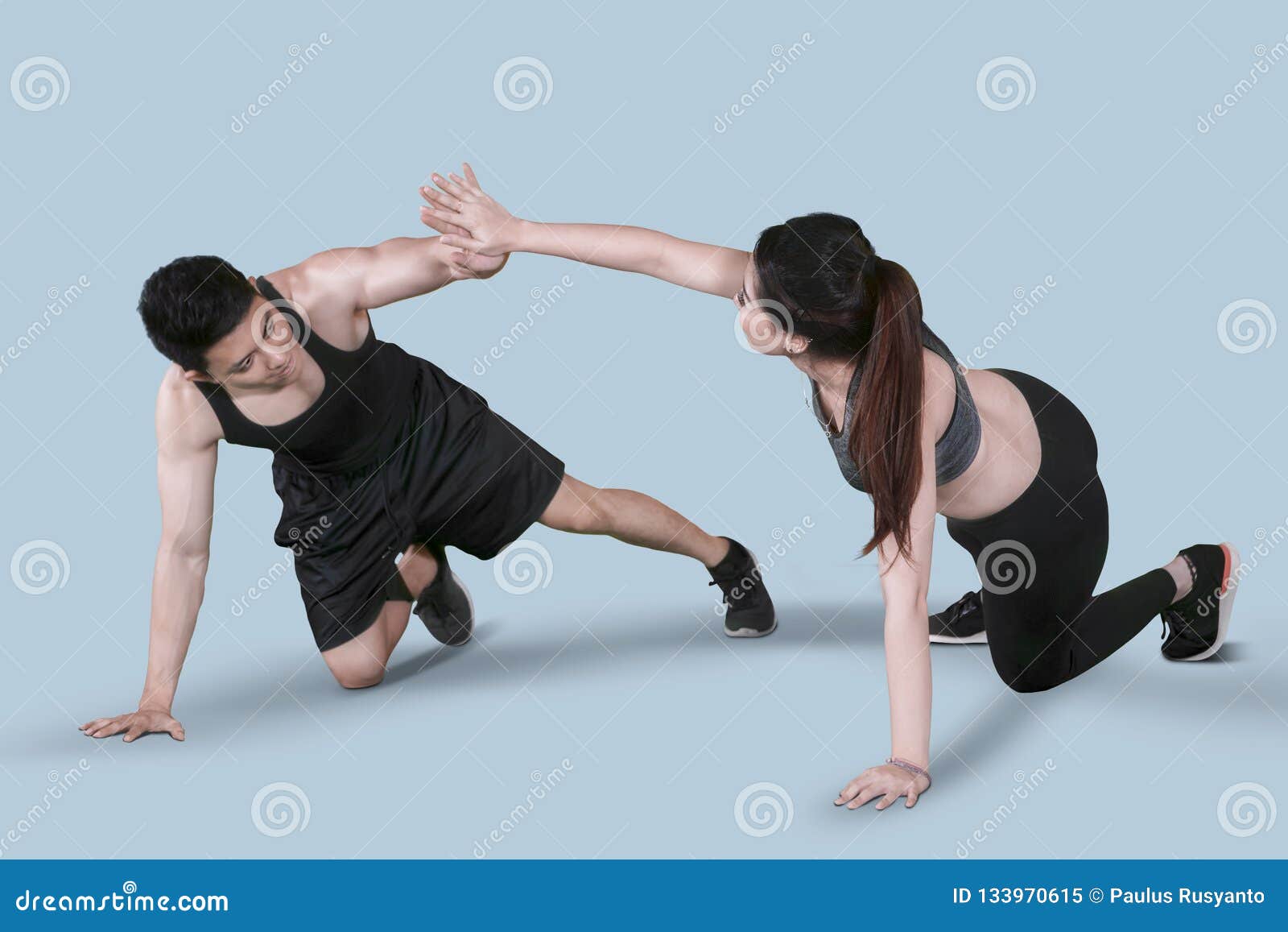 Couple Making High Five while Doing Plank Pose Stock Image - Image of ...