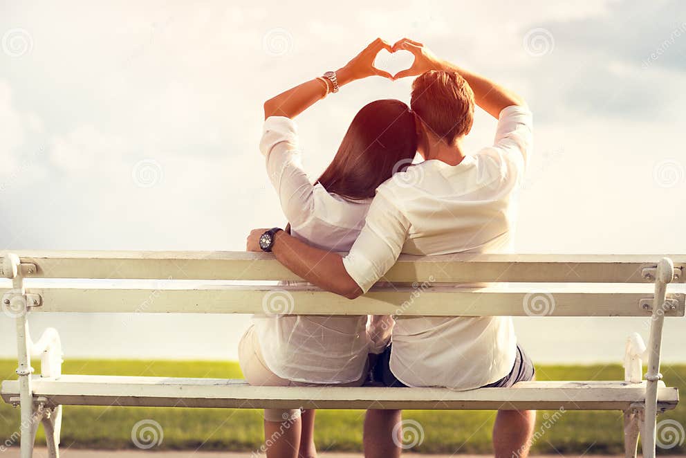 Couple Making a Love Symbol with Hands Stock Photo - Image of lovers ...