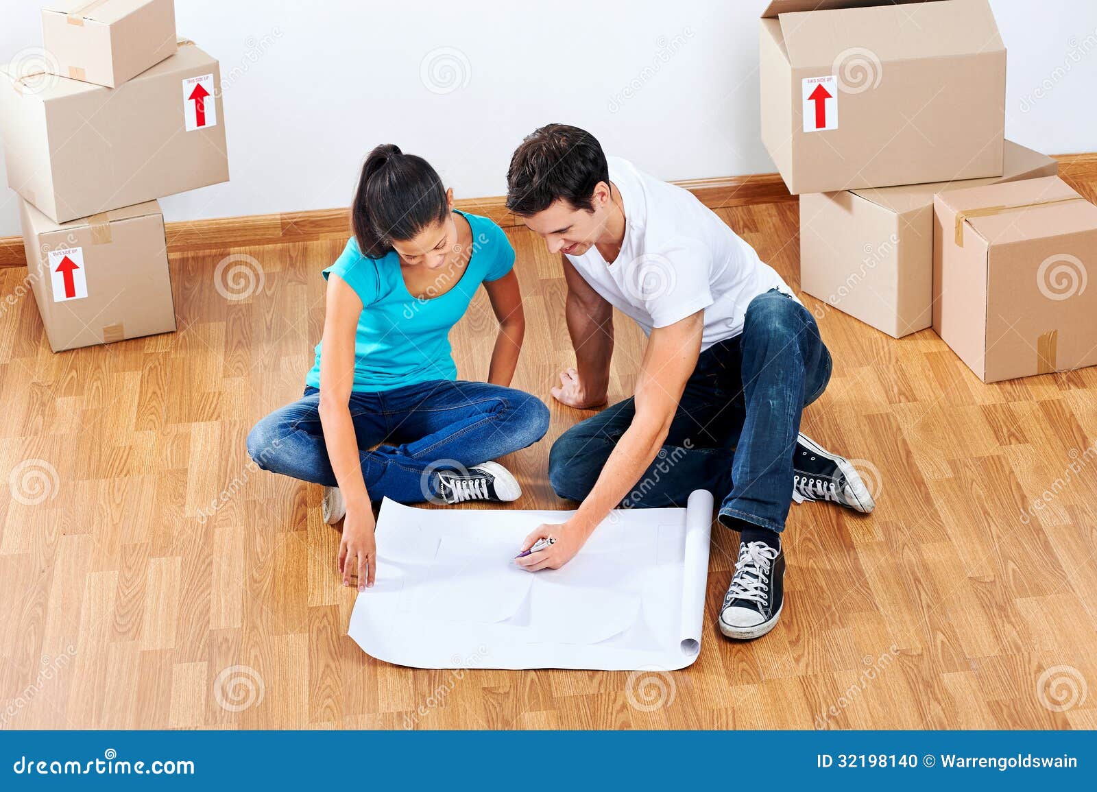 Couple making plans stock photo. Image of life, interior - 32198140