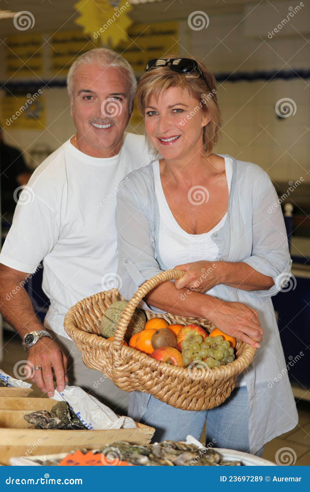 Couple making purchase stock image. Image of blonde, tenderness - 23697289