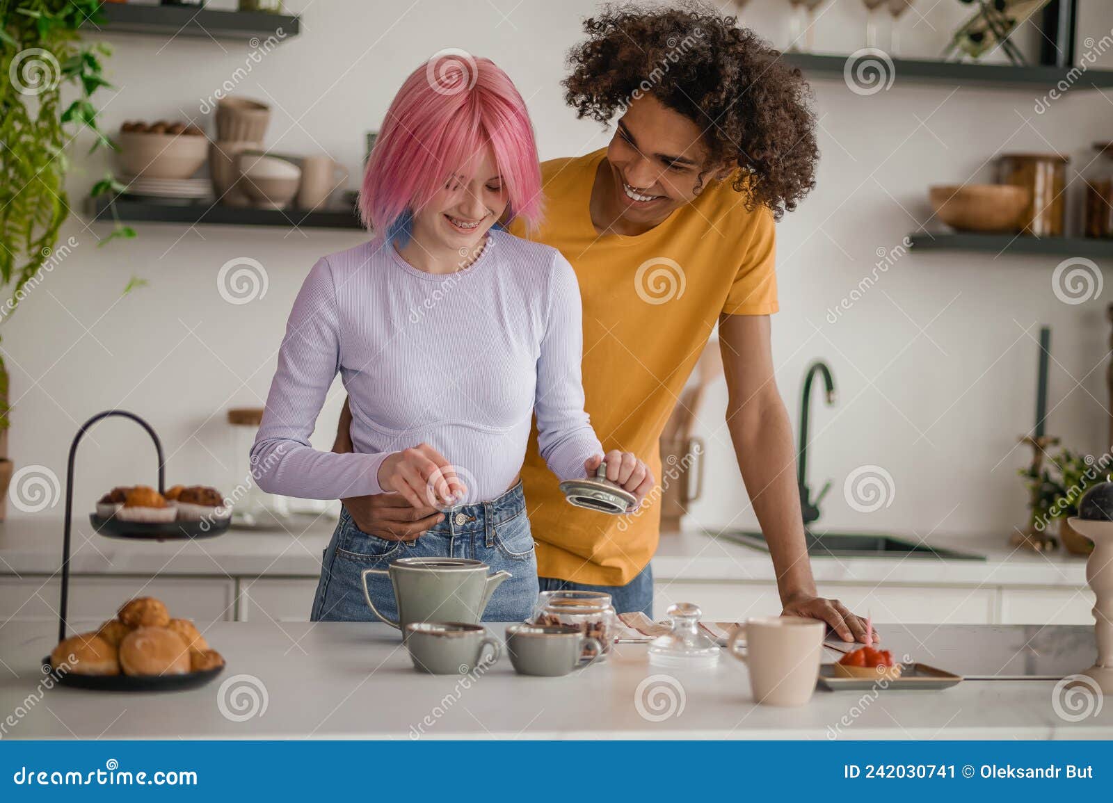 A Couple Making Tea in the Kitchen Stock Image - Image of morning ...