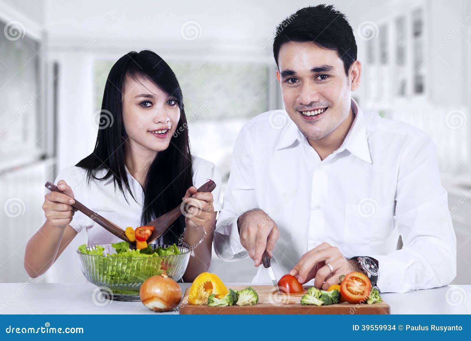 Couple Making Vegetables Salad Stock Photo - Image of food, love: 39559934