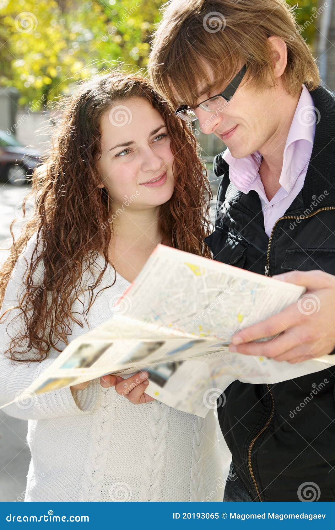 Couple with map stock image. Image of brunette, together - 20193065