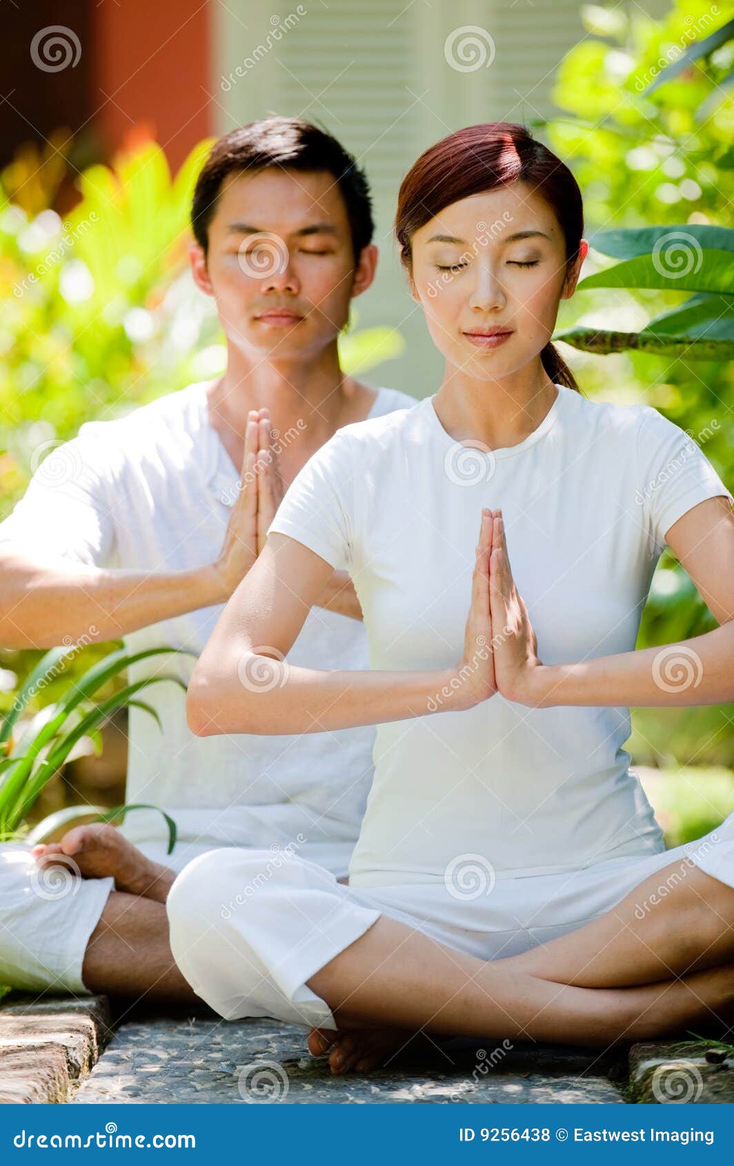 Couple Meditating stock photo. Image of meditating, couple - 9256438