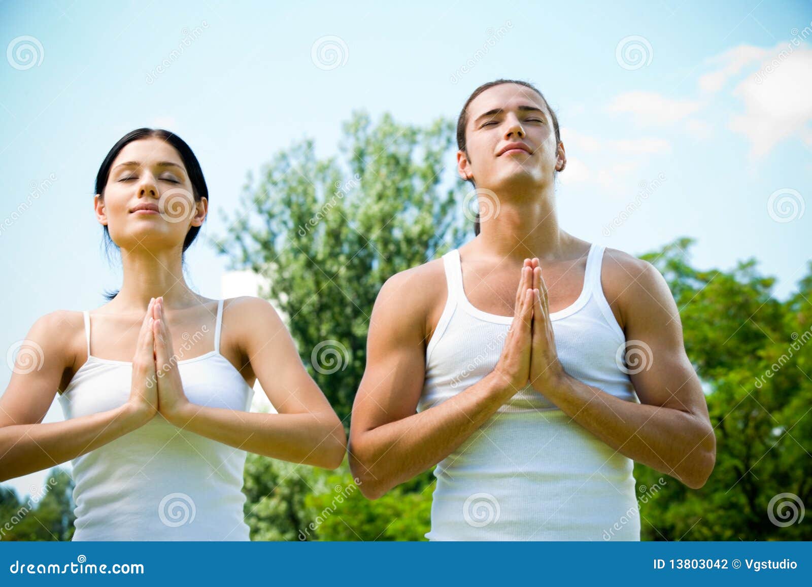 Couple Meditating or Praying Stock Photo - Image of healthy, calm: 13803042