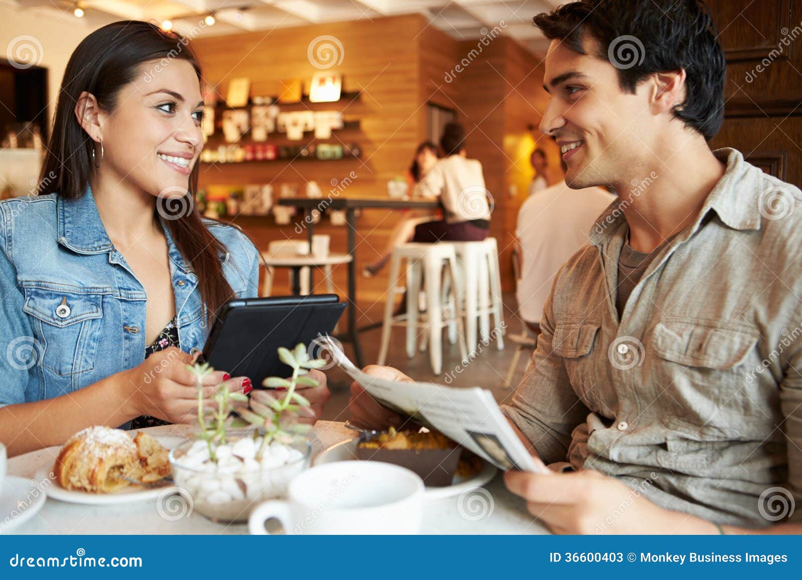 Couple Meeting in Busy Cafe Restaurant Stock Image - Image of native ...