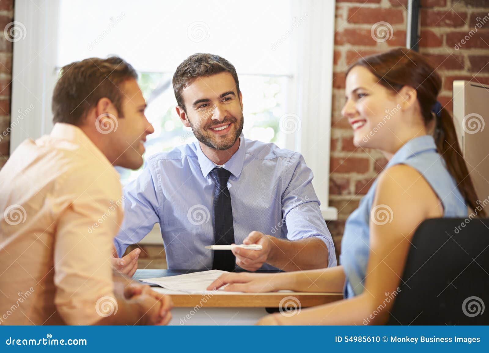 Couple Meeting with Financial Advisor in Office Stock Photo - Image of ...