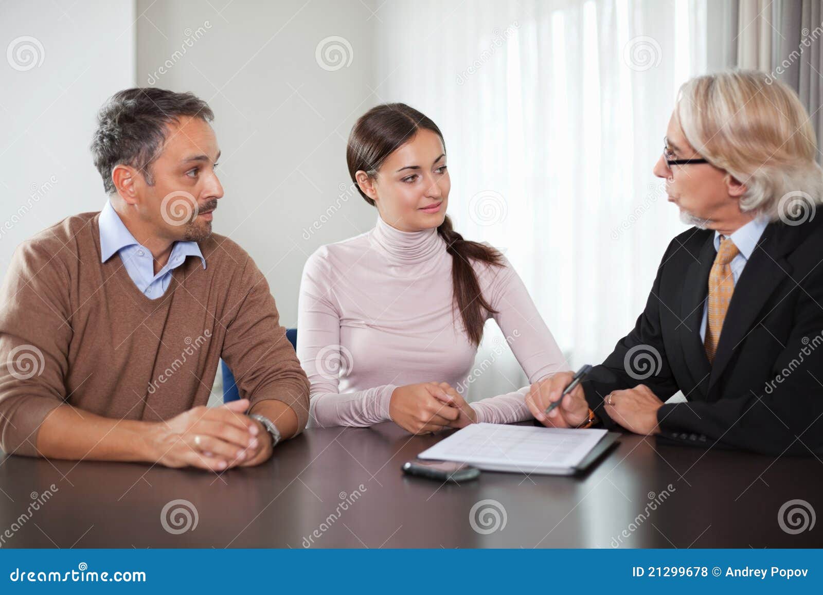 Couple in Meeting with a Financial Planner Stock Photo - Image of ...