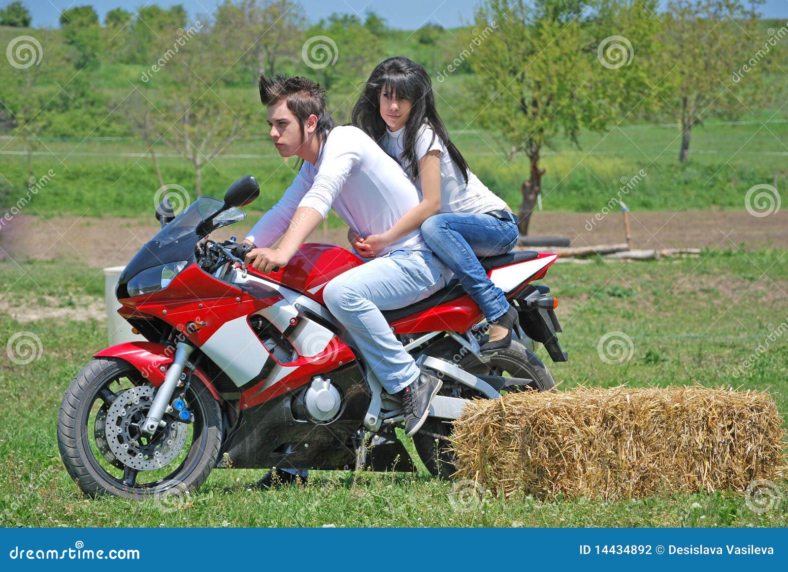 Couple on a motorbike stock photo. Image of countryside - 14434892