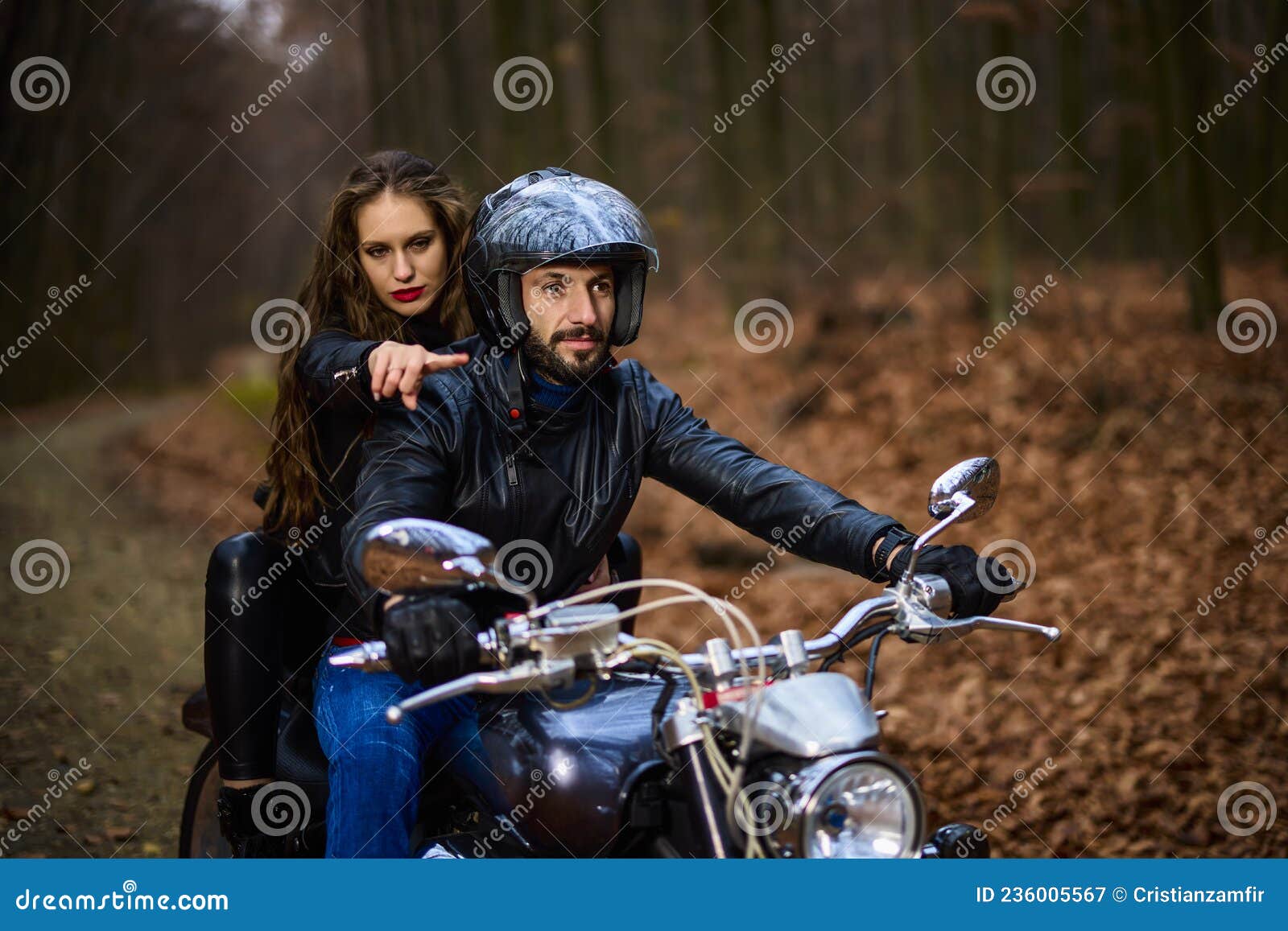 Couple of Motorcyclists with a Chopper. Stock Image - Image of forest ...
