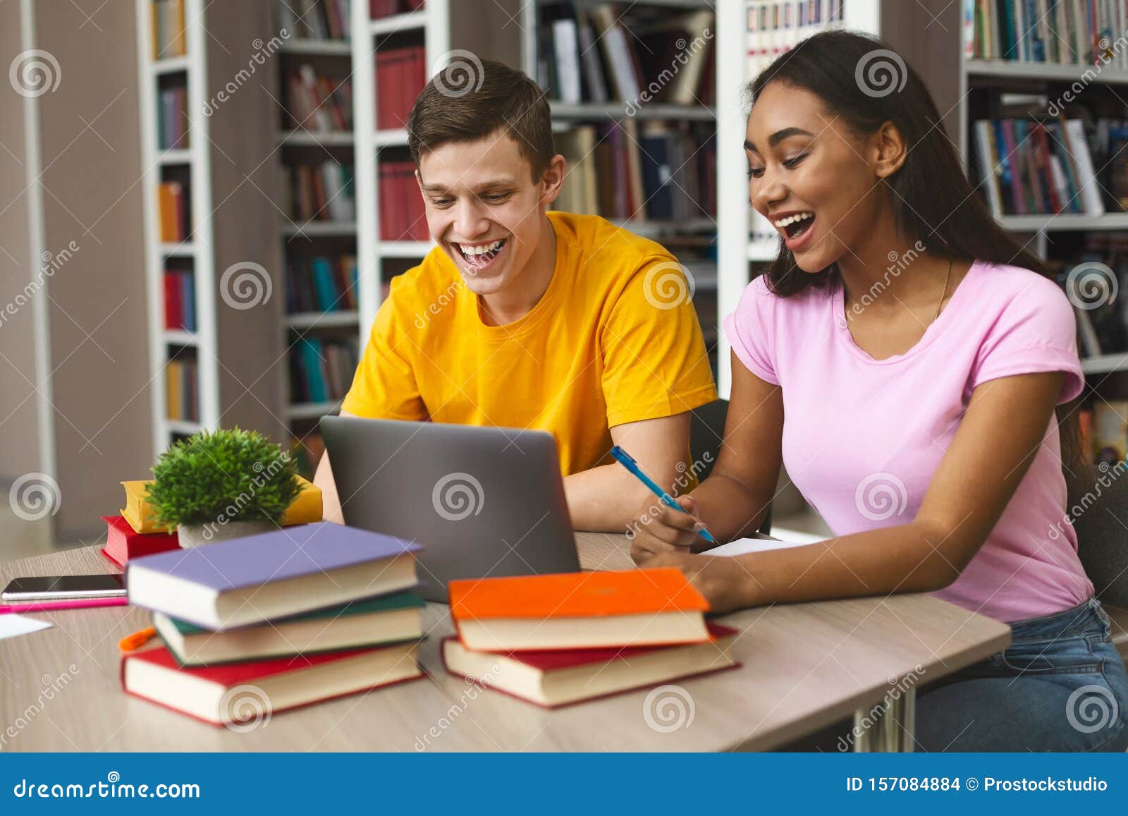 Couple of Multinational Students Working with Science Project in ...