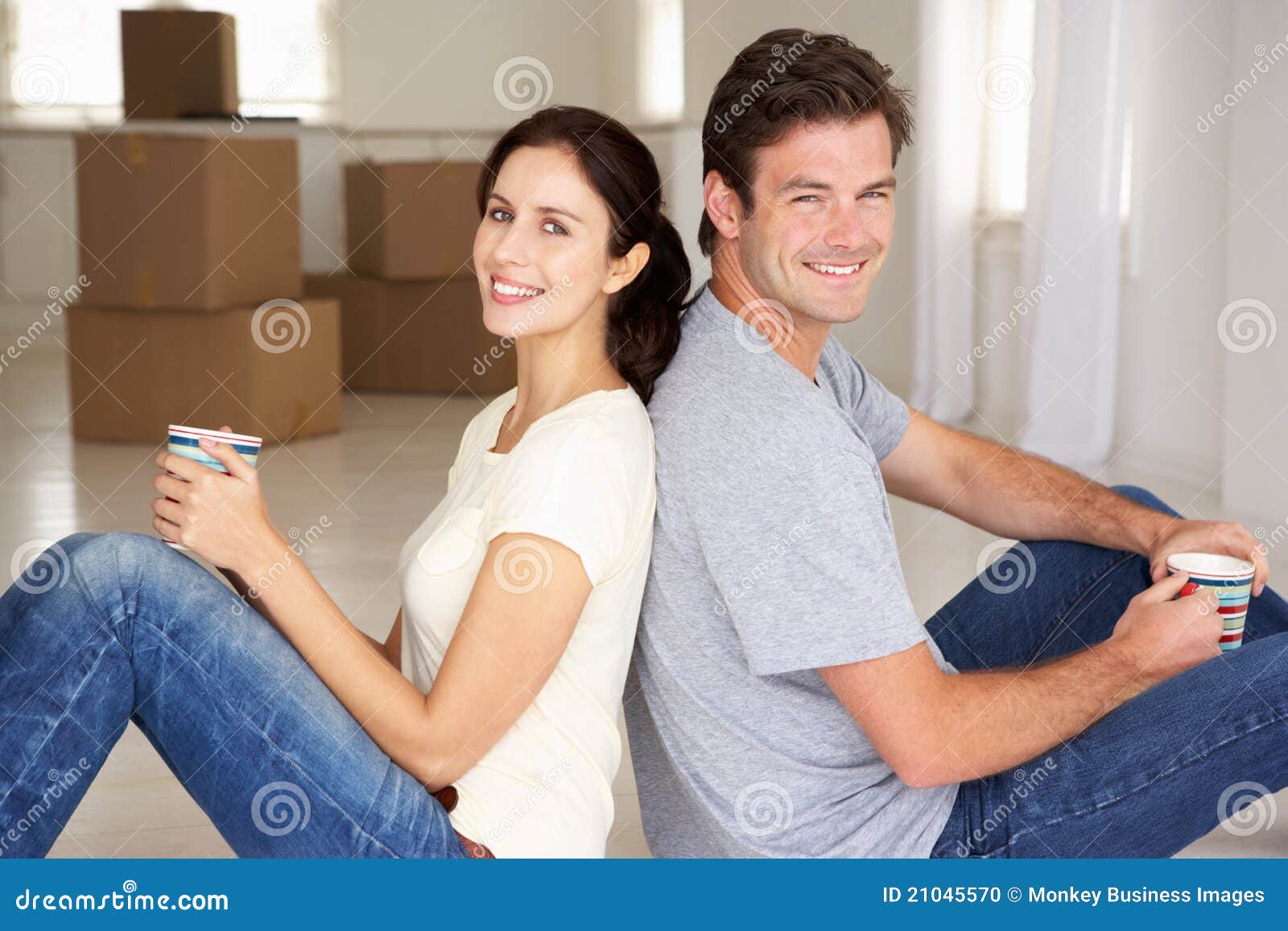 Couple in new home stock photo. Image of boxes, estate - 21045570
