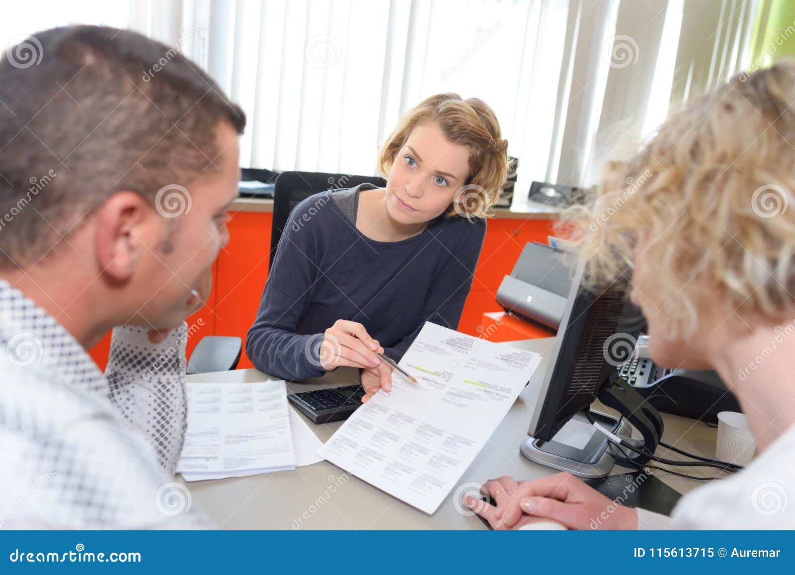 Couple and Office Worker Checking Paperwork Stock Image - Image of ...