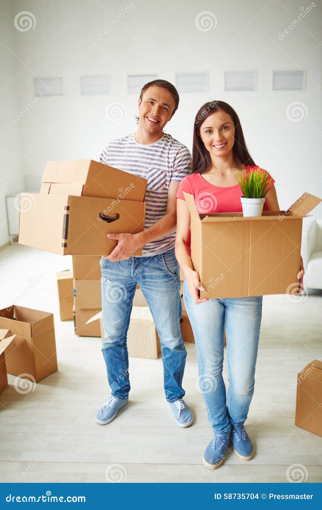 Couple with packages stock photo. Image of looking, contemporary - 58735704