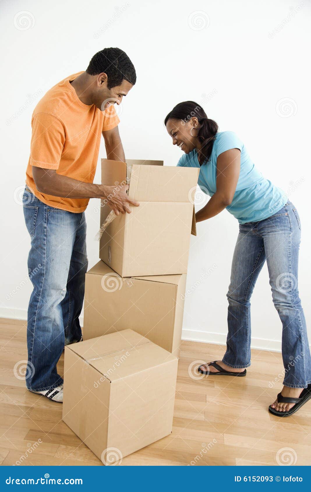 Couple packing boxes stock image. Image of happy, lifestyle - 6152093