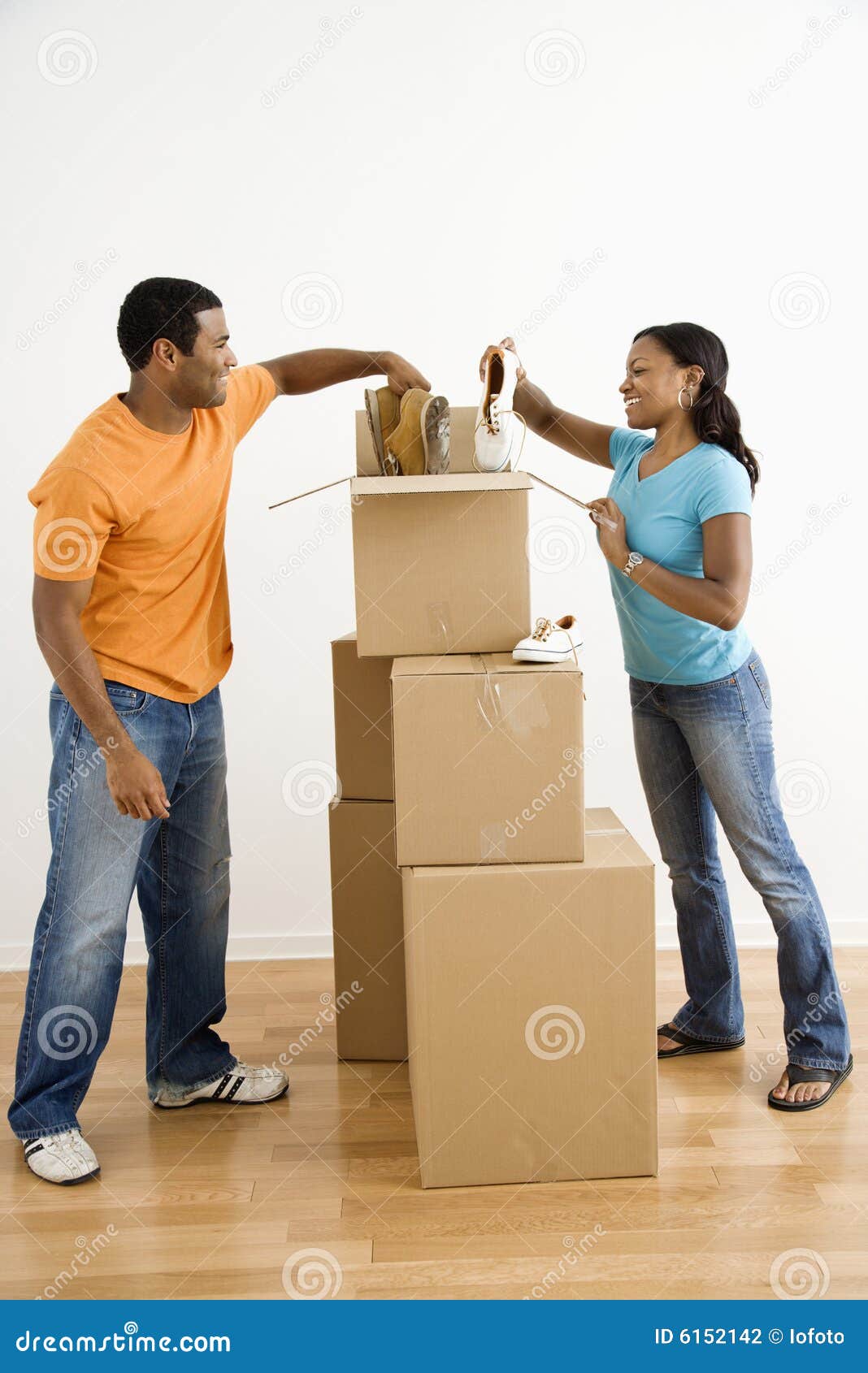 Couple packing boxes stock photo. Image of relationship - 6152142