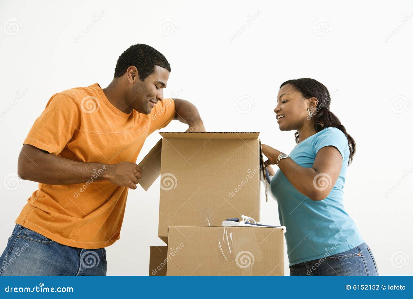 Couple packing together. stock photo. Image of beginnings - 6152152