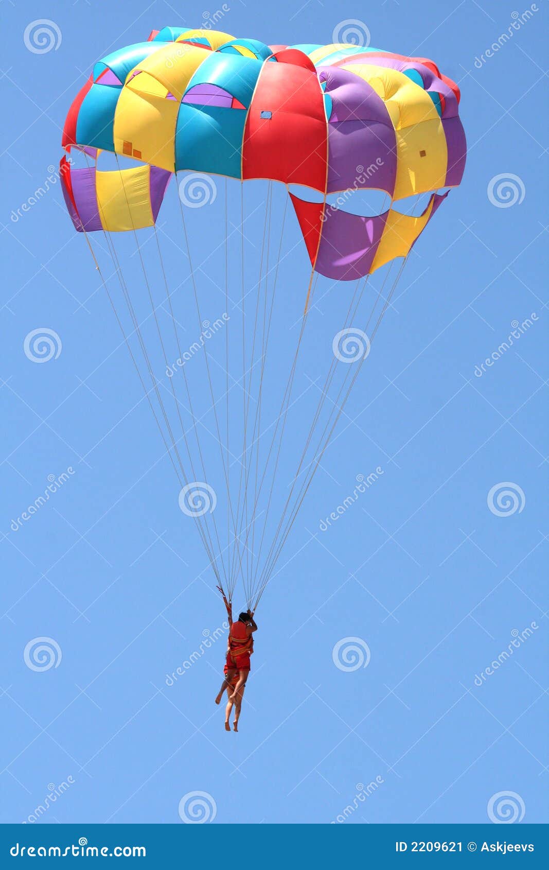 Couple with a Parachute stock image. Image of parasailing - 2209621