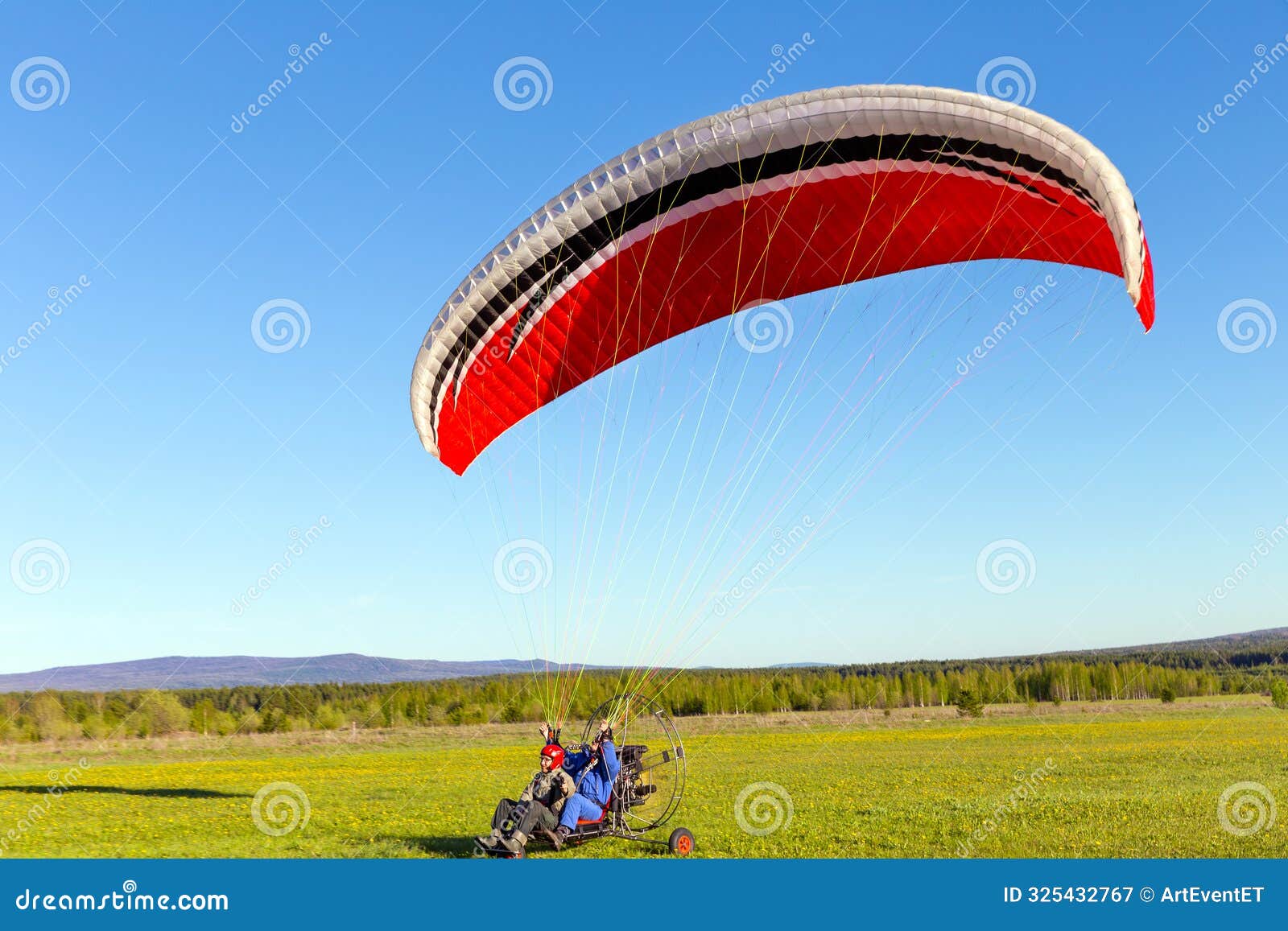 Couple Paraglider Flight. Two Athletes Take Off Using Motor, Propeller ...