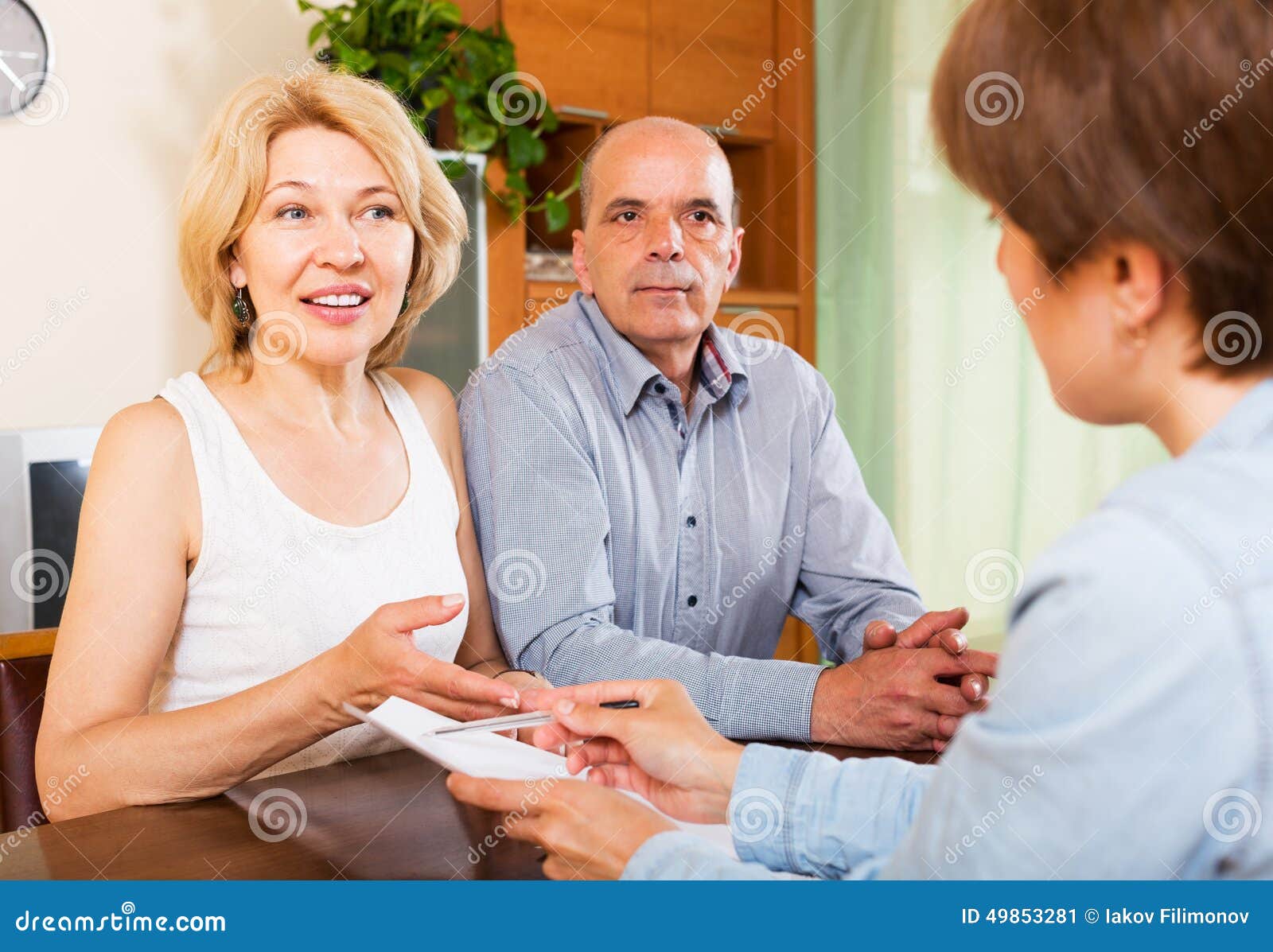 Couple of Pensioners Talking with Manager Stock Image - Image of ...