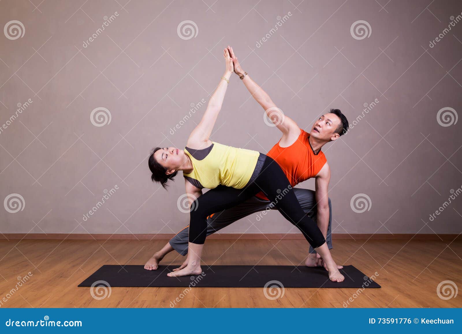 Yoga With Partner, Seated And Standing Forward Bend Stock Photography ...