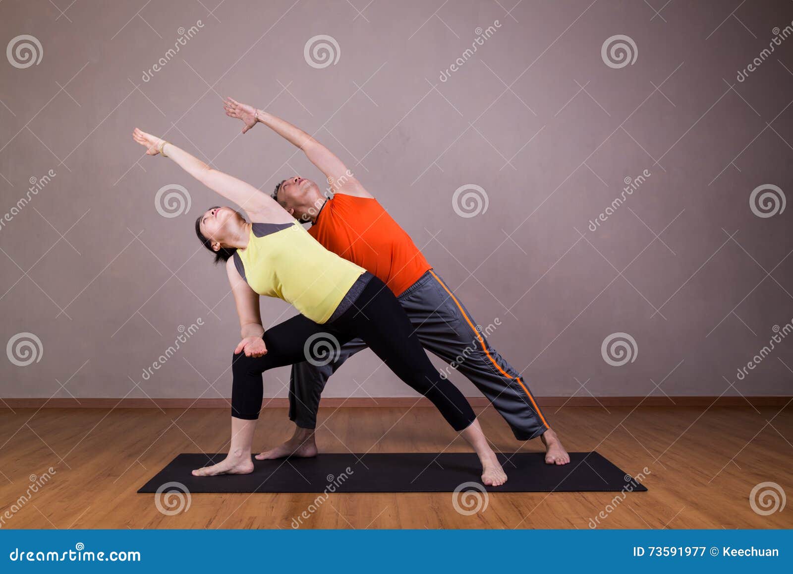 Yoga With Partner, Seated And Standing Forward Bend Stock Photography ...