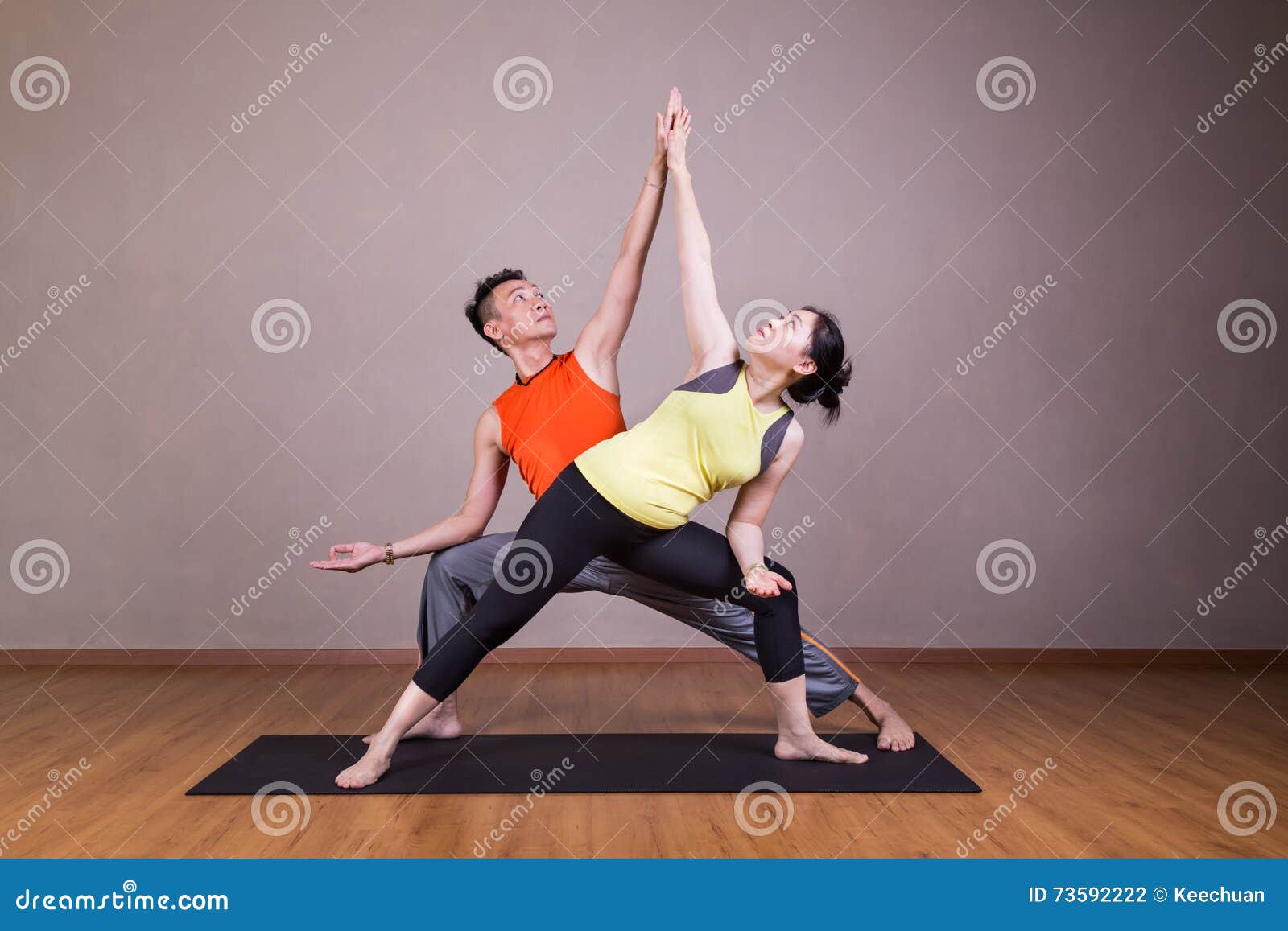 Couple Perform Series of Extended Side Angle Yoga Partner Pose Stock ...