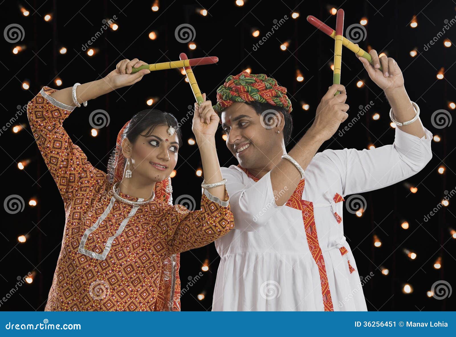 Couple Performing Dandiya Raas on Navratri Stock Image - Image of ...