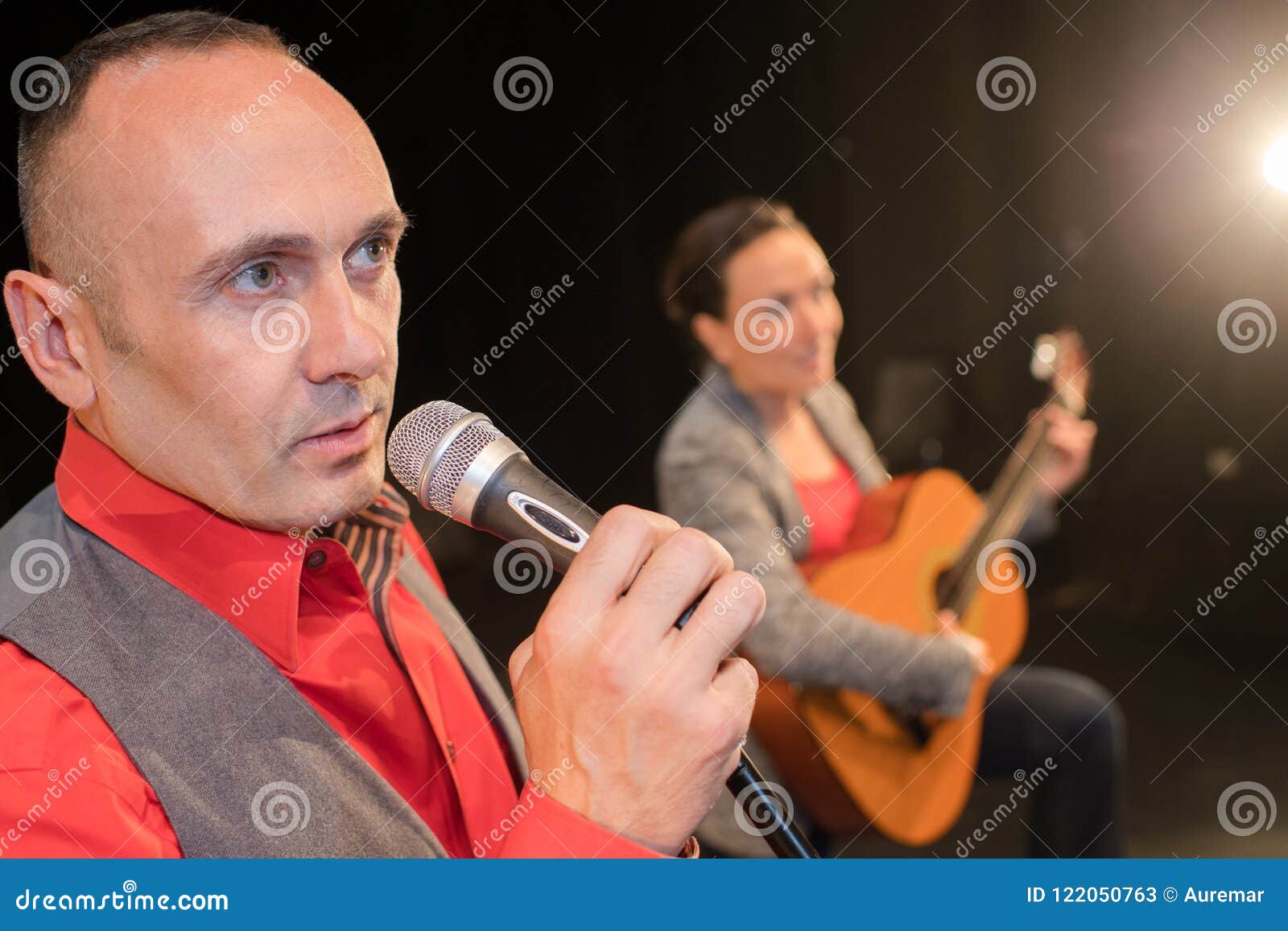 Couple Performs Duet on Stage Stock Image - Image of instrument ...