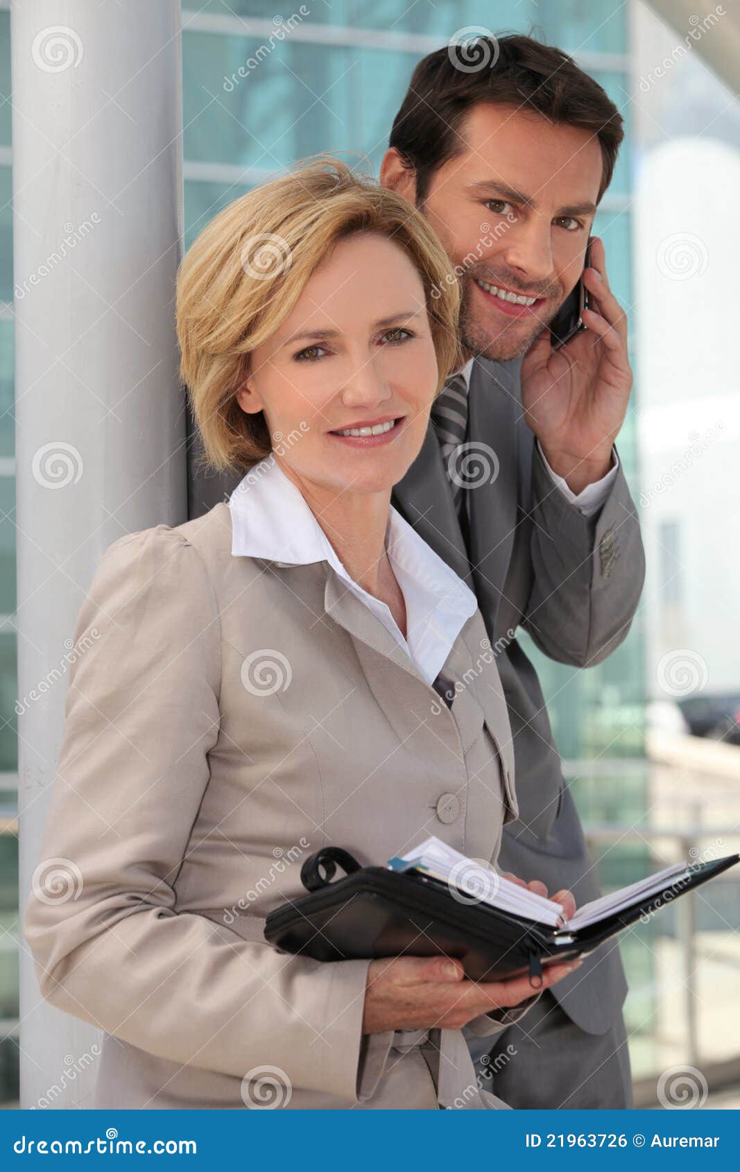 Couple with a Personal Organizer Stock Photo - Image of communicate ...