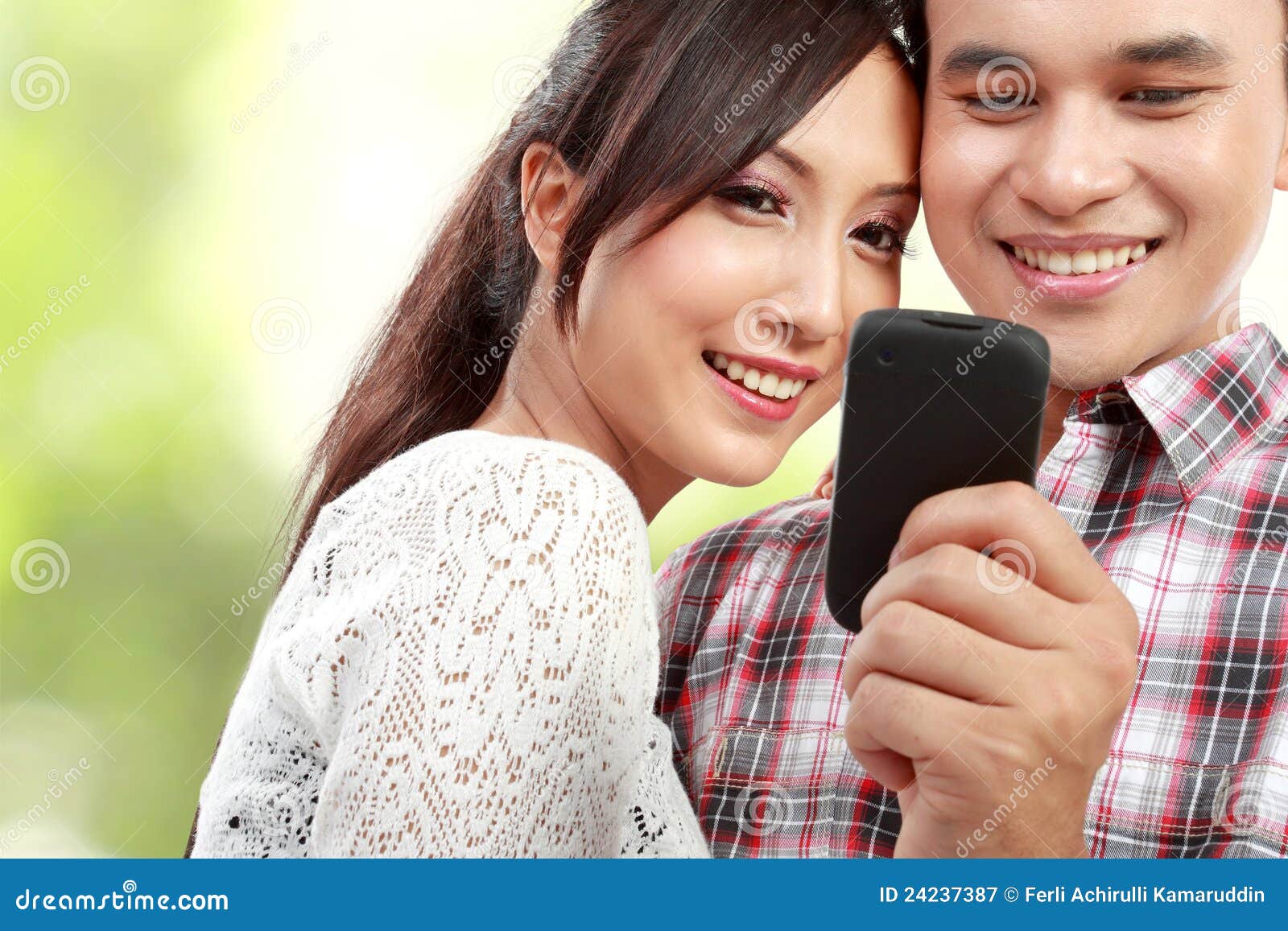 Couple with phone stock image. Image of male, mobile - 24237387