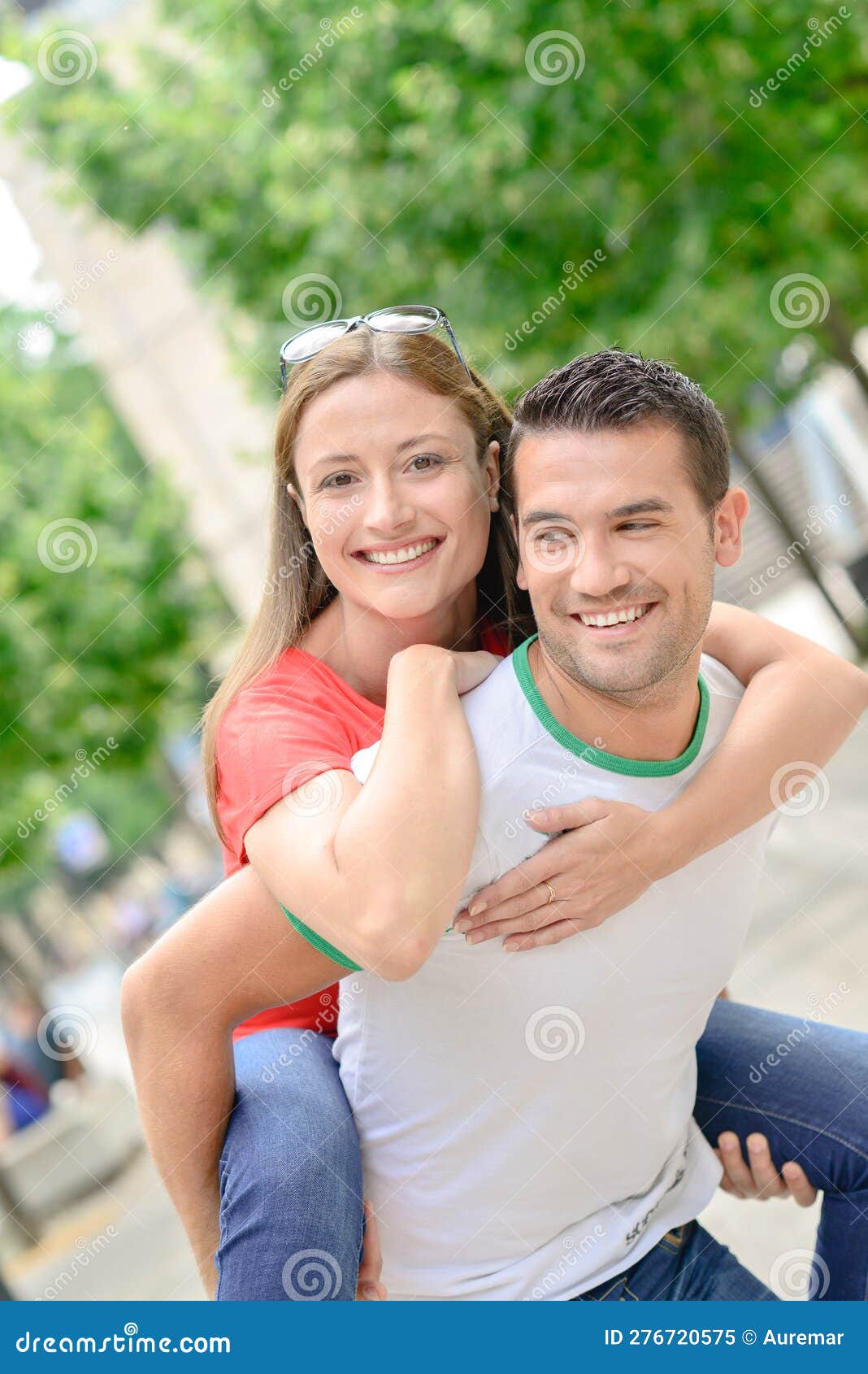 Couple on piggy back stock image. Image of leisure, outdoors - 276720575