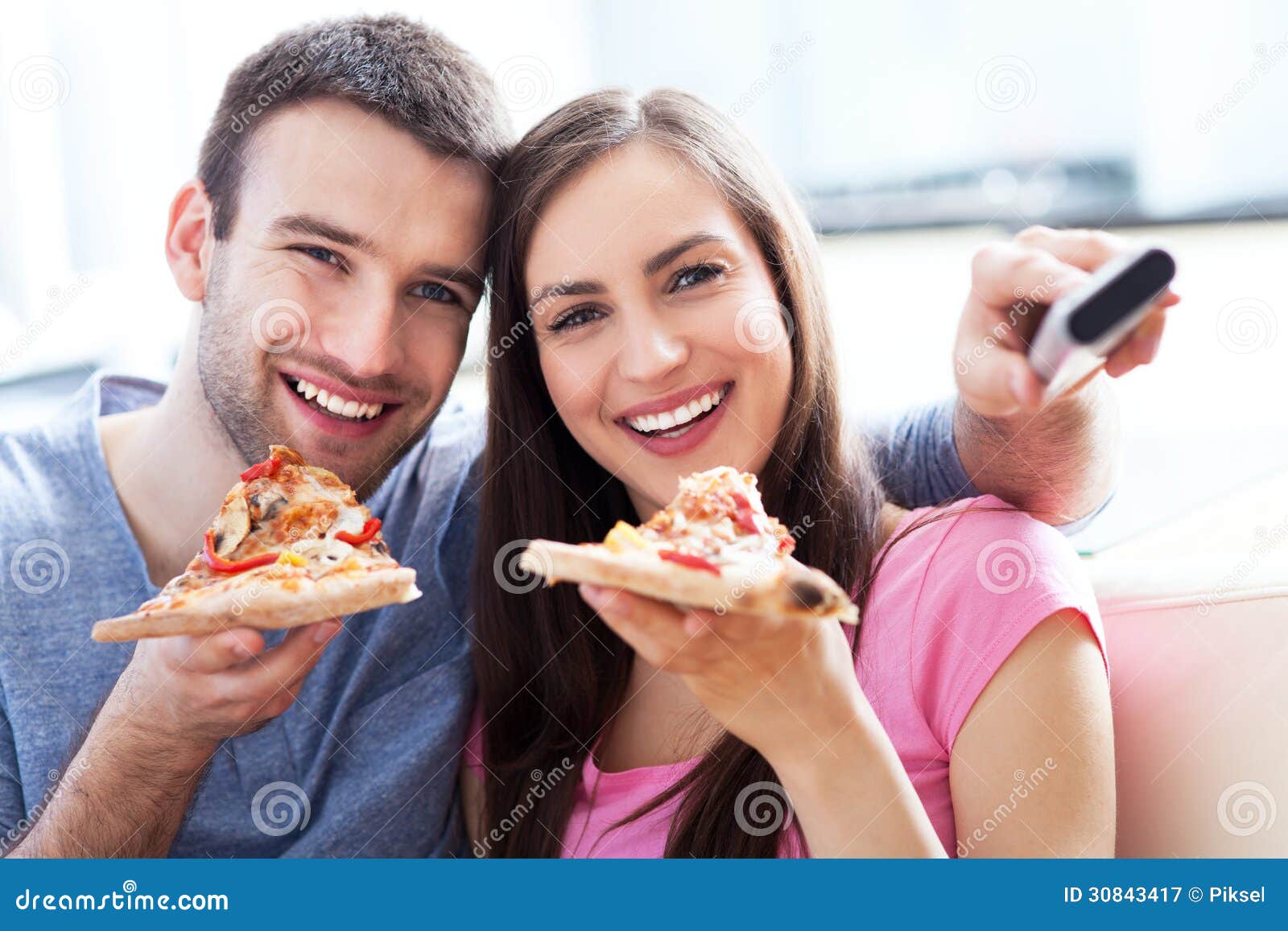Couple with Pizza and TV Remote Stock Image - Image of lifestyle, slice ...