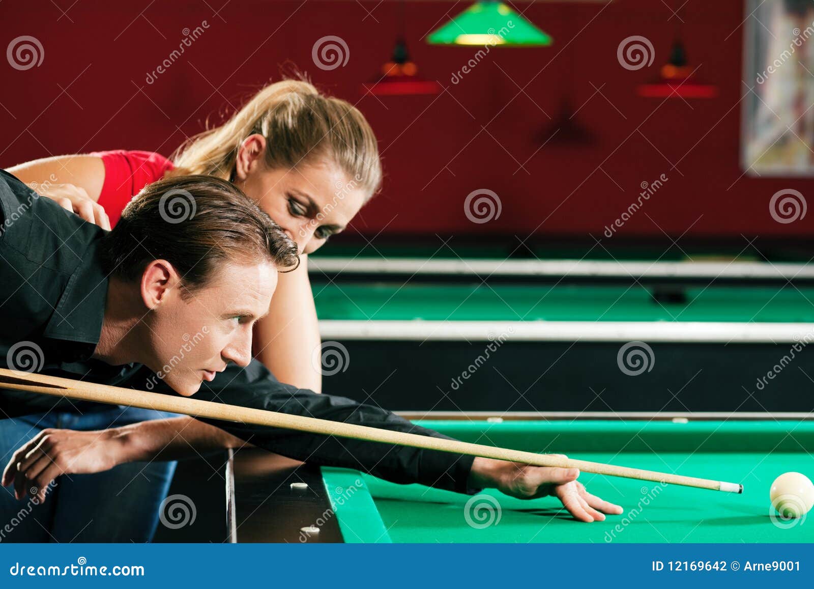 Couple playing billiards stock photo. Image of people - 12169642