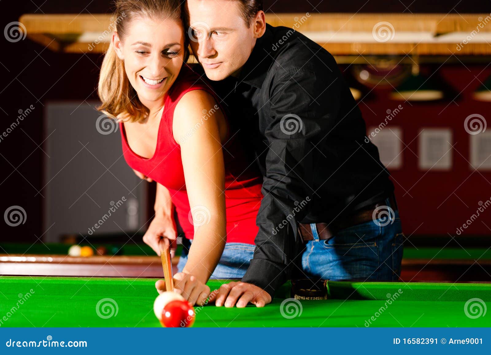 Couple playing billiards stock image. Image of recreation - 16582391