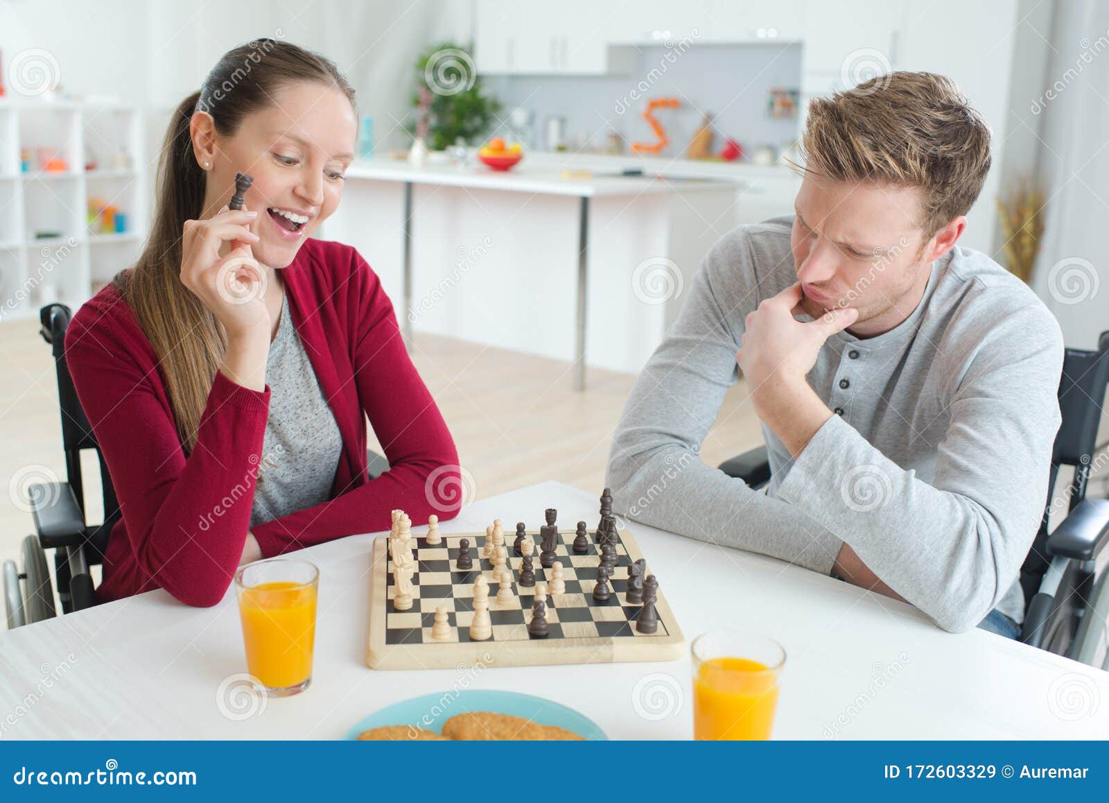 Couple playing chess stock image. Image of laugh, enjoy - 172603329