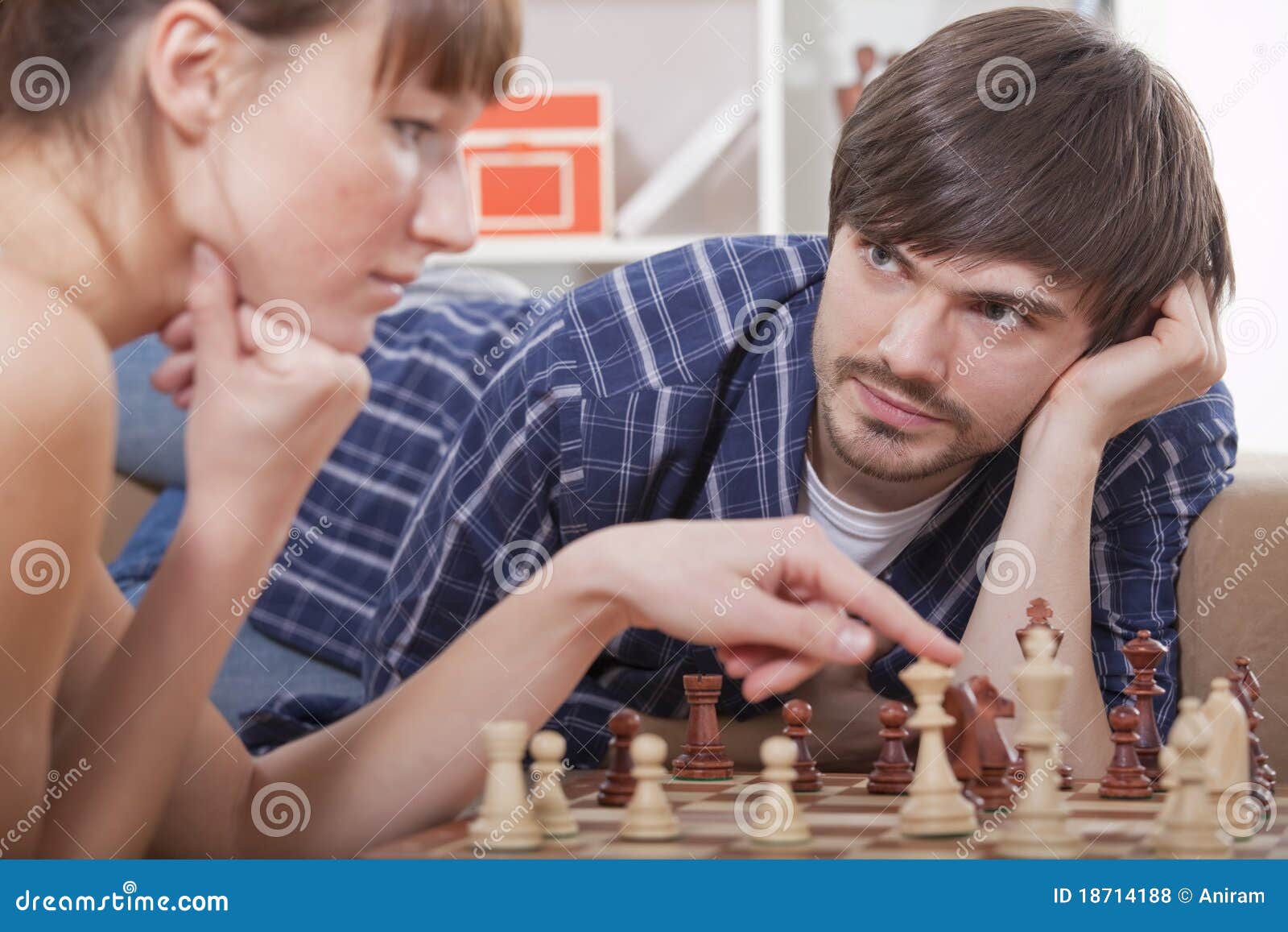 Couple playing chess stock photo. Image of home, together - 18714188