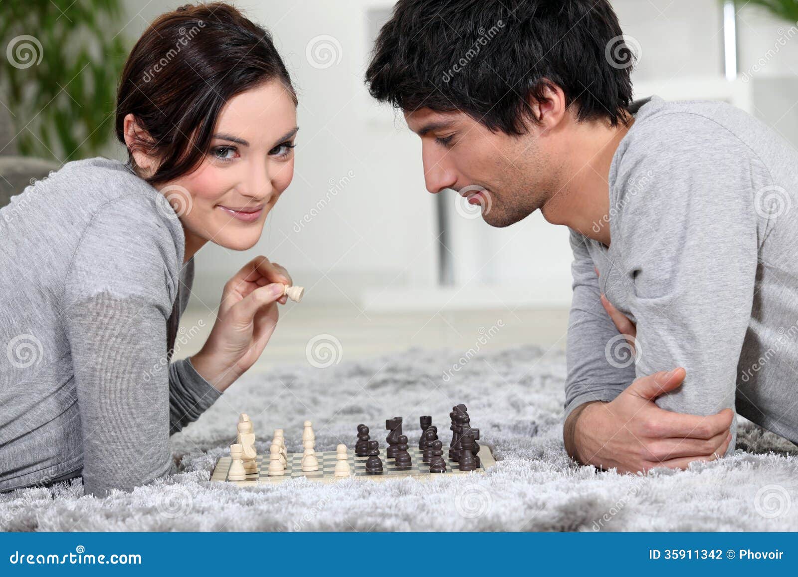 Couple playing chess stock photo. Image of hand, difficult - 35911342