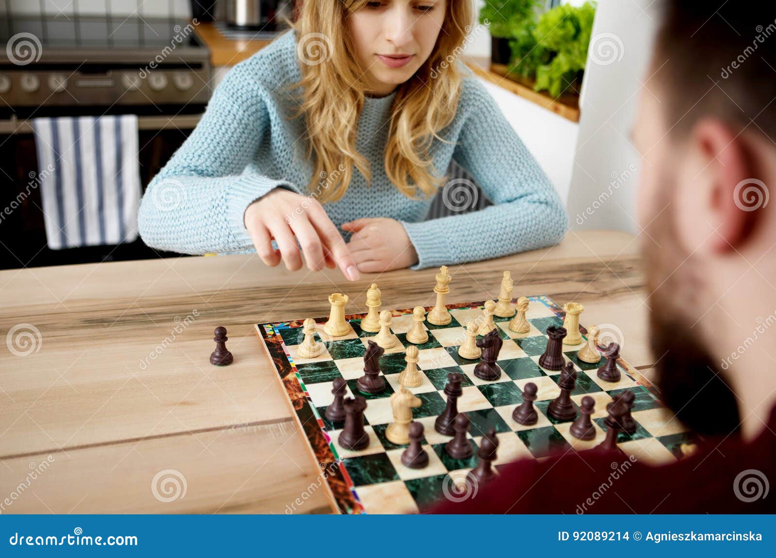 Couple playing chess. stock photo. Image of leisure, love - 92089214