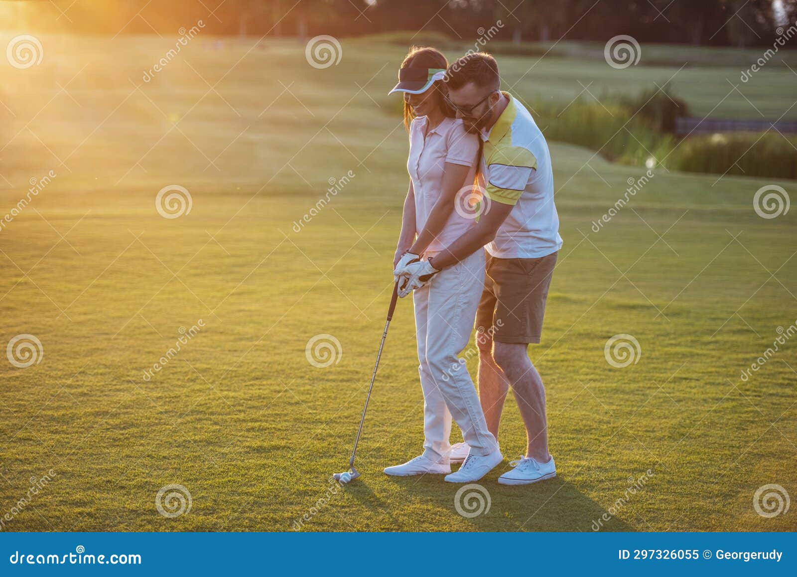 Couple playing golf stock image. Image of golfer, player - 297326055