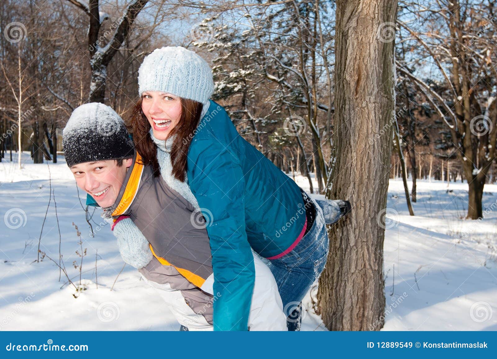 Couple playing in snow stock image. Image of loving, adult - 12889549