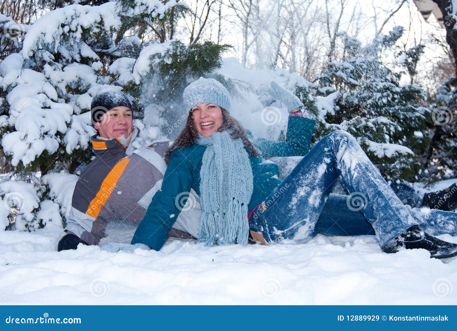 Couple playing in snow stock image. Image of female, outdoors - 12889929