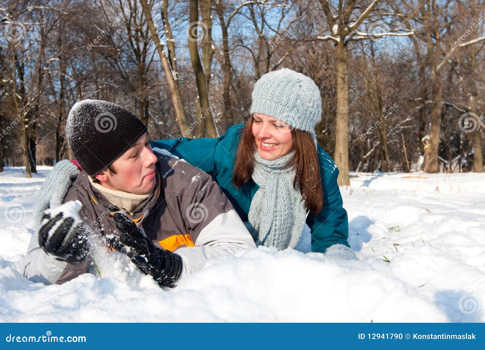 Couple playing in snow stock photo. Image of loving, nature - 12941790