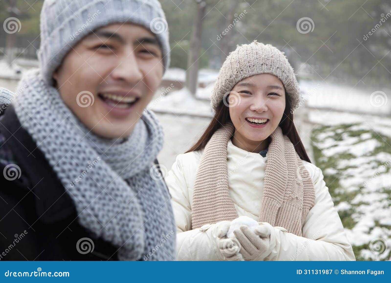 Couple Playing in the Snow, Laughing Stock Image - Image of laughing ...