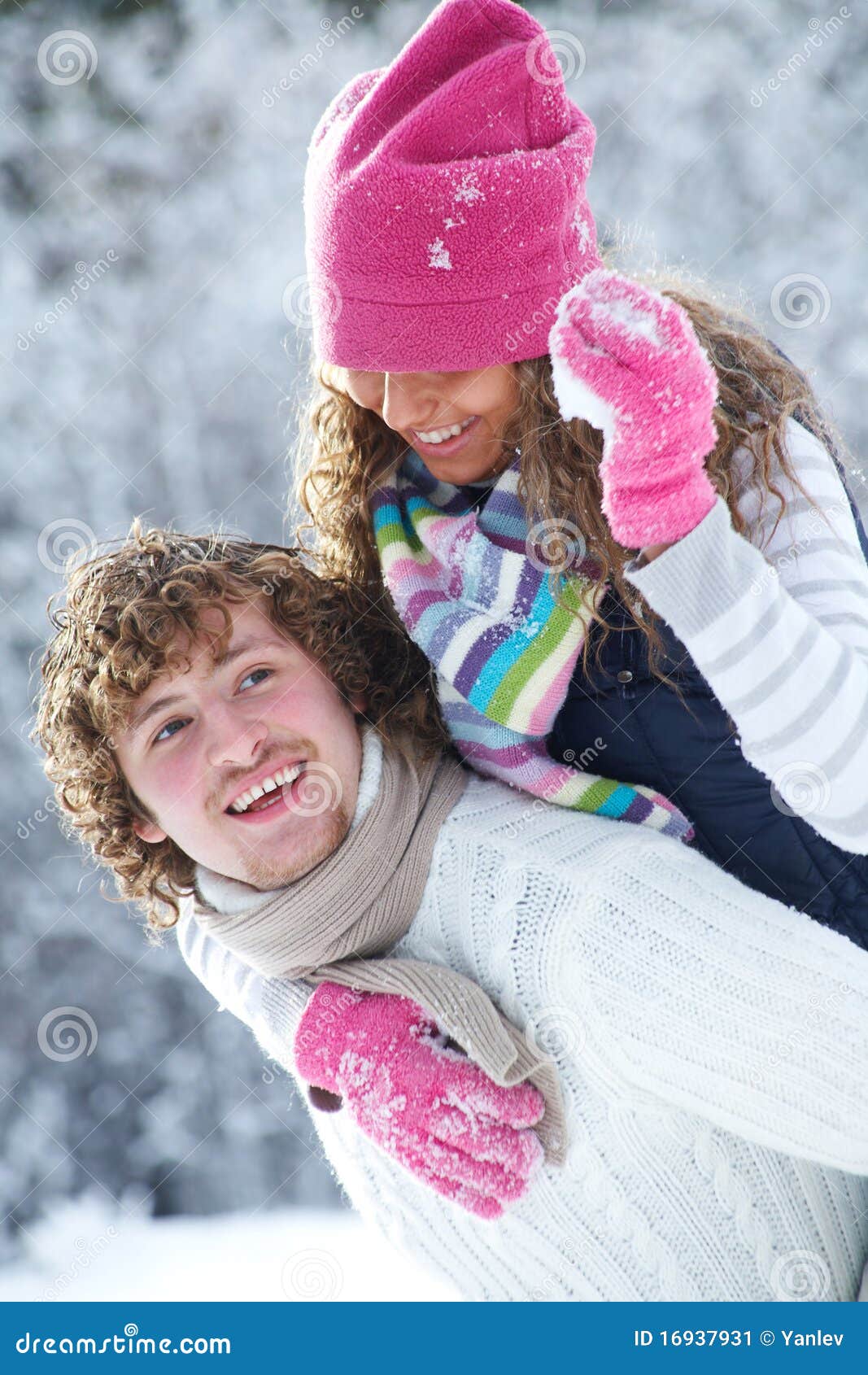Couple playing snowballs stock image. Image of holiday - 16937931