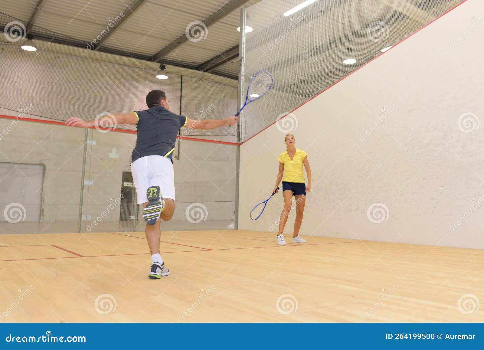 Couple Playing Squash on Indoor Court Stock Photo - Image of girl ...