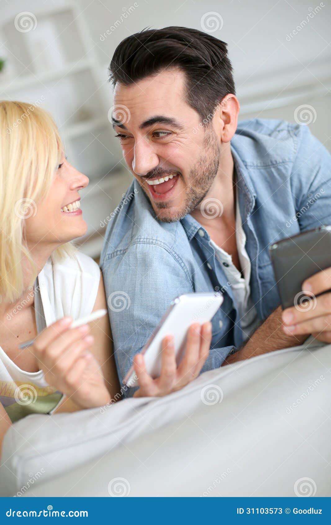 Couple Playing Together with Smartphones Stock Image - Image of ...