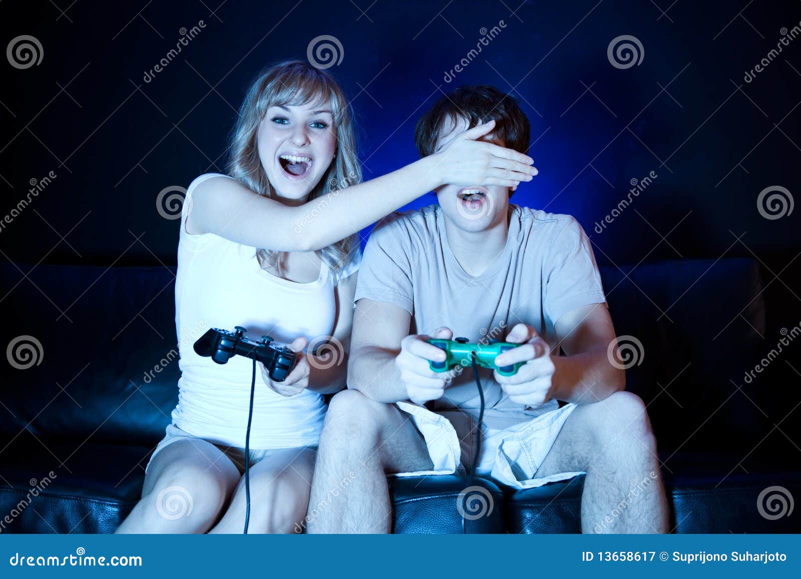 Couple playing video games stock image. Image of horizontal - 13658617