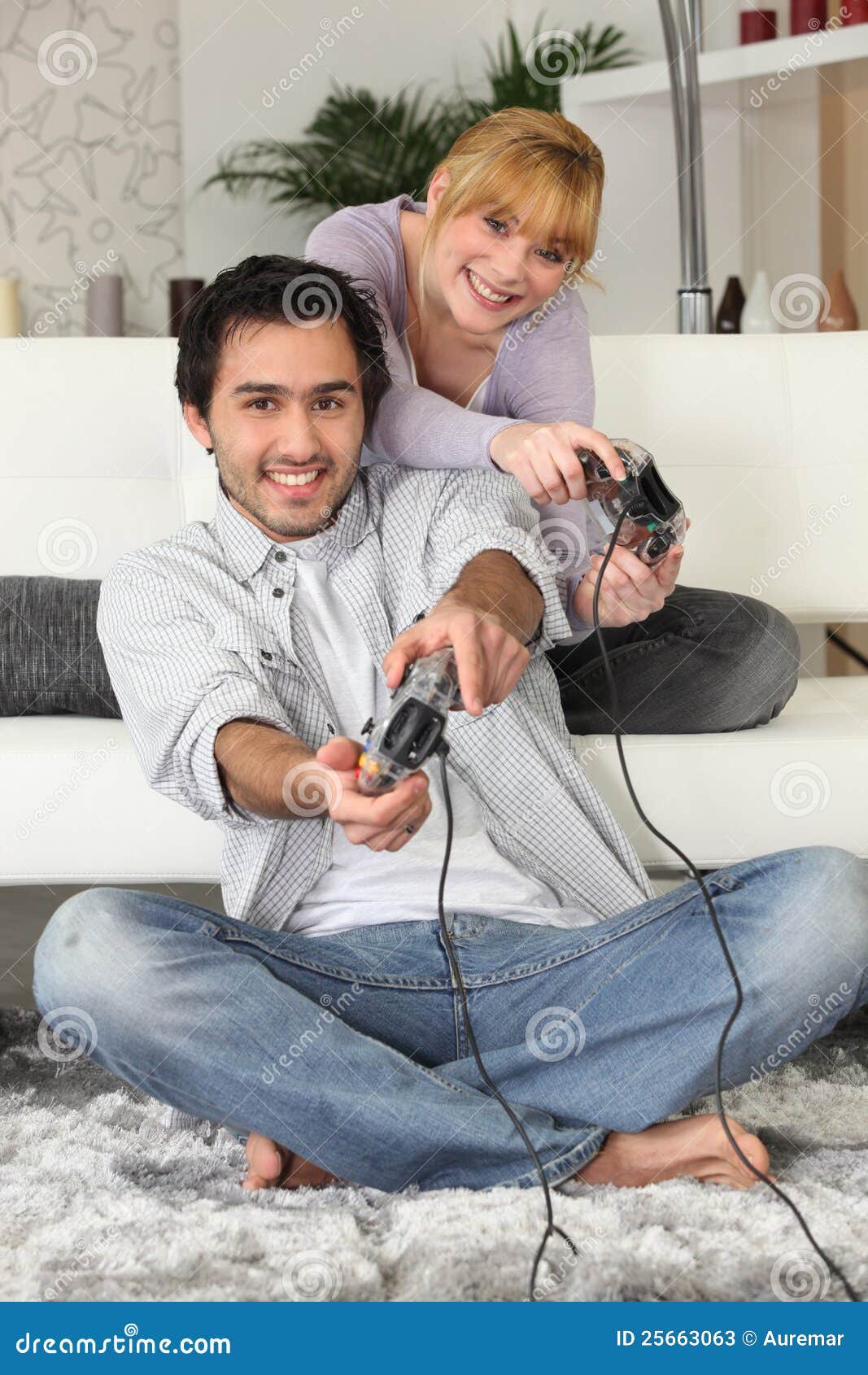 Couple playing video games stock image. Image of video - 25663063