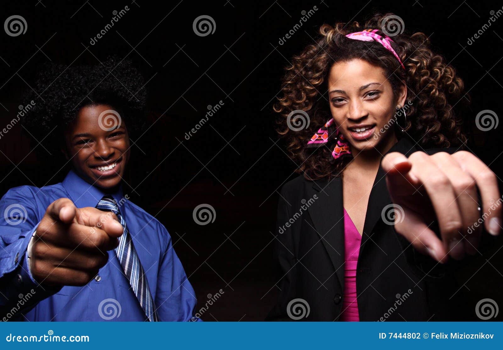 Couple Pointing at the Camera Stock Photo - Image of smile, female: 7444802
